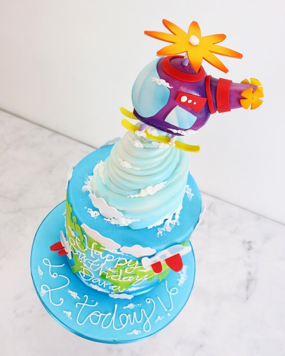 Around The World – Tuck Box Cakes